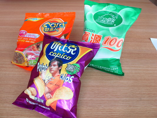 4 Head Weigher Snacks Packing Machine , potato chips / popcorn packing machine supplier