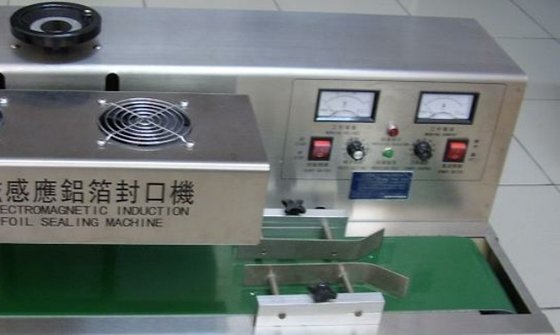 Automatic Aluminum Foil Lid Sealing Machine With 1-200 Bottles / Min Capacity , 220V/50HZ supplier