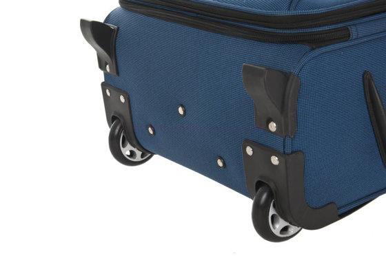 Dark blue trolley travel bag with two adjustable compression straps