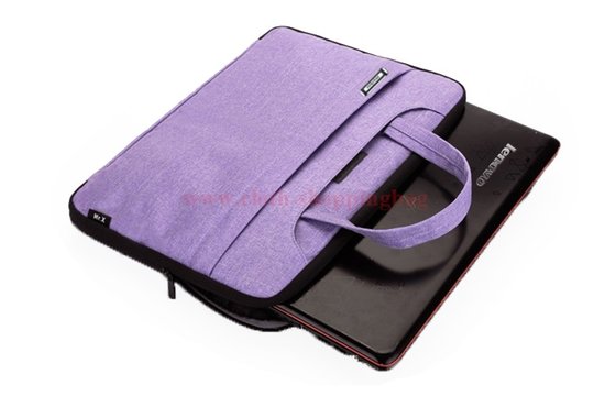 Green small nylon laptop computer bag with full - size exterior magazine pocket