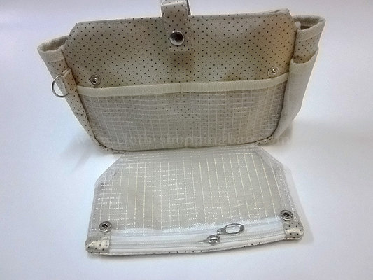 Delicate travel cosmetic handbag with a small mirror inside
