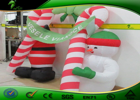Waterproof Inflatable Holiday Decorations Christmas Candy Cane Arch With Santa