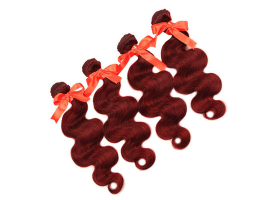 El cabello humano 4 de la onda del cuerpo de 100 Peruvian lía color rojo de las extensiones #99J