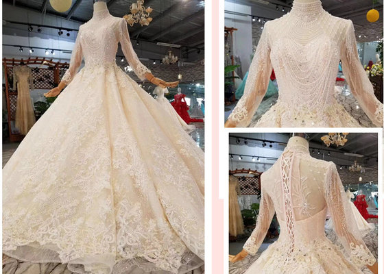 Hand-made new champagne-coloured luxury crystal long-sleeved trailing lace wedding dress in autumn and winter