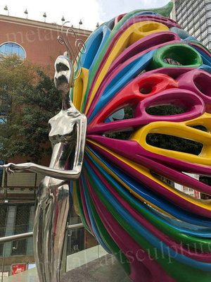 Human Body With Wings Metal Art Sculpture Painted Color As City Landmark