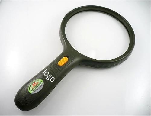 Pocket magnifier and LED