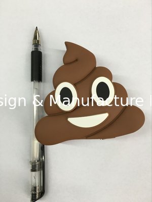 novel pvc rubber silicone cartoon shit shaped 2600mah power bank supplier