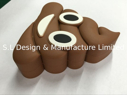 novel pvc rubber silicone cartoon shit shaped 2600mah power bank supplier