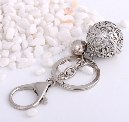 hollow out small bell keychain