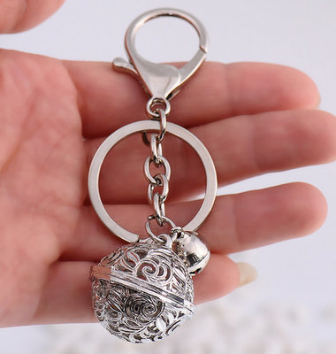 hollow out small bell keychain