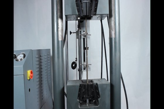 Shock Absorption Servo Hydraulic Universal Testing Machine 2-30mm Flat Specimen