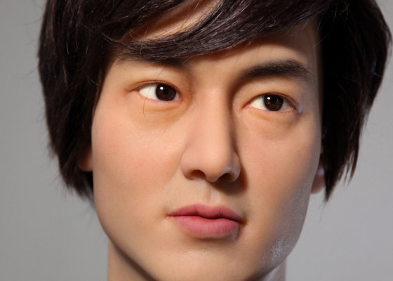 Figure di cera a grandezza naturale vive su ordinazione della Corea di Lee MinHo per la manifestazione della celebrità