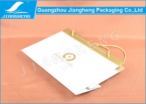 Bolsas de papel impresas logotipo blanco de la marca grandes con las manijas de oro del algodón